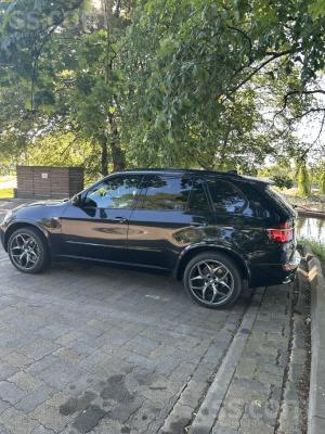 Black BMW X5 2011 in Jelgava, with an engine capacity of 3.00 L and mileage of 176 thousand km for 12500 €, photo 3 on AUTOMOTO.COM.LV