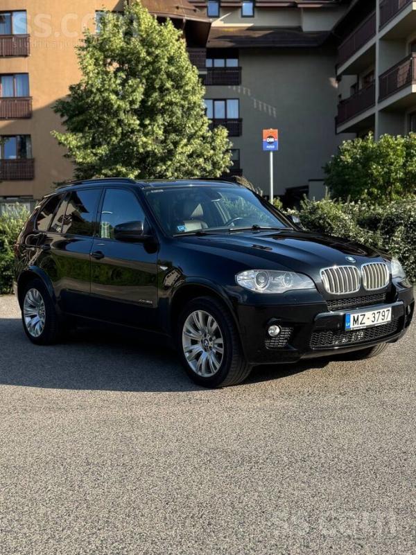 Black BMW X5 2011 in Riga, with an engine capacity of 4.00 L and mileage of 268 thousand km for 11400 €, photo 4 on AUTOMOTO.COM.LV
