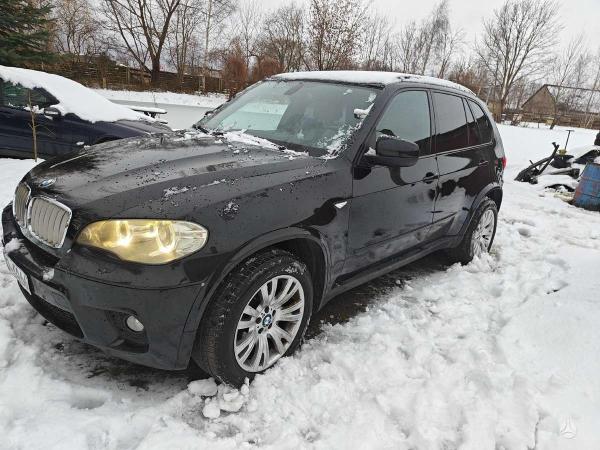 Black BMW X5 2011 in Klaipeda, with an engine capacity of 2.99 L and mileage of 217 thousand km for 9250 €, photo 1 on AUTOMOTO.COM.LV