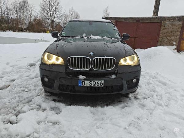 Black BMW X5 2011 in Klaipeda, with an engine capacity of 2.99 L and mileage of 217 thousand km for 9250 €, photo 4 on AUTOMOTO.COM.LV