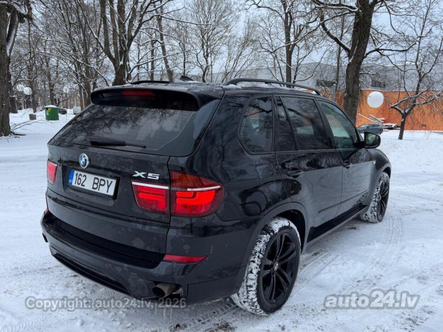 Black BMW X5 2011 in Johvi, with an engine capacity of 3.50 L and mileage of 220 thousand km for 11900 €, photo 6 on AUTOMOTO.COM.LV