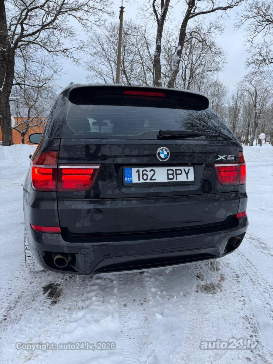 Black BMW X5 2011 in Johvi, with an engine capacity of 3.50 L and mileage of 220 thousand km for 11900 €, photo 7 on AUTOMOTO.COM.LV