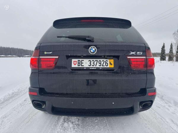 Black BMW X5 2011 in Vilnius, with an engine capacity of 2.99 L and mileage of 260 thousand km for 9700 €, photo 6 on AUTOMOTO.COM.LV