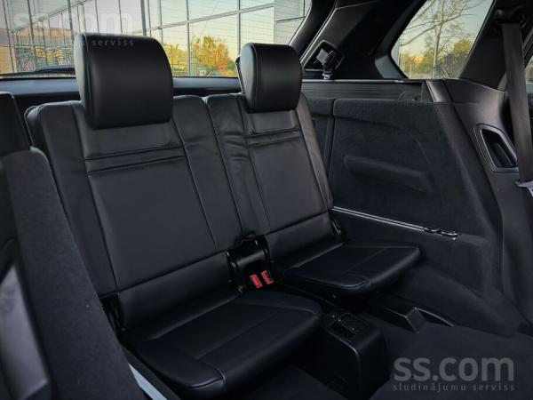 Black BMW X5 2011 in Riga, with an engine capacity of 3.00 L and mileage of 248 thousand km for 13950 €, photo 8 on AUTOMOTO.COM.LV