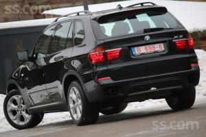 Black BMW X5 2011 in Riga, with an engine capacity of 3.00 L and mileage of 0 thousand km for 11690 €, photo 6 on AUTOMOTO.COM.LV