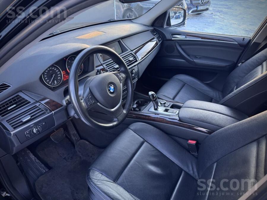 Black BMW X5 2011 in Riga, with an engine capacity of 3.00 L and mileage of 225 thousand km for 10990 €, photo 16 on AUTOMOTO.COM.LV