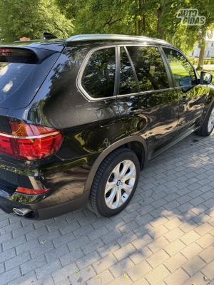 Black BMW X5 2011 in Sakiai, with an engine capacity of 3.00 L and mileage of 336 thousand km for 9000 €, photo 19 on AUTOMOTO.COM.LV