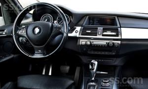 Black BMW X5 2011 in Riga, with an engine capacity of 3.00 L and mileage of 245 thousand km for 13500 €, photo 6 on AUTOMOTO.COM.LV