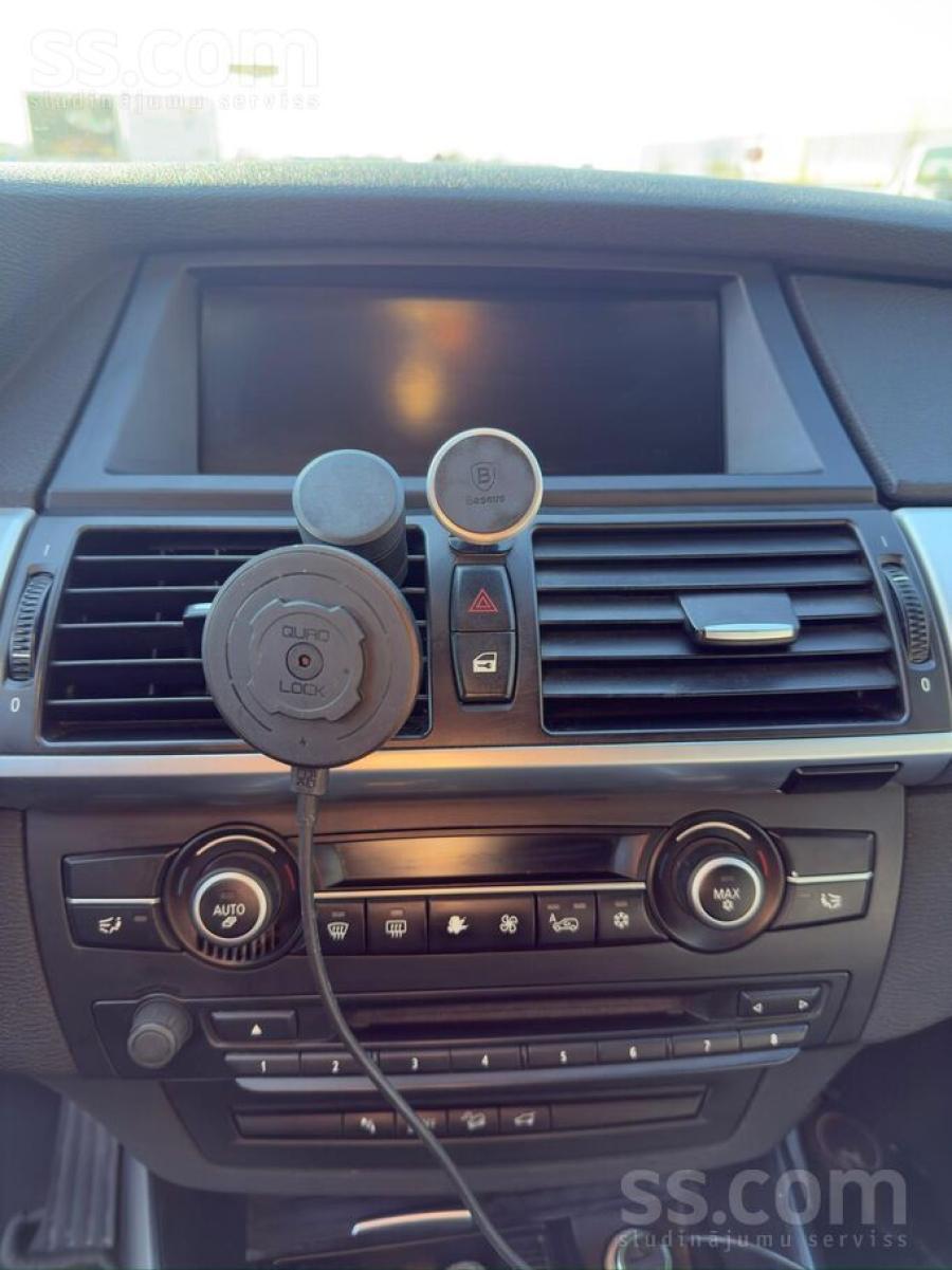 Black BMW X5 2011 in Riga, with an engine capacity of 3.00 L and mileage of 0 thousand km for 11500 €, photo 9 on AUTOMOTO.COM.LV