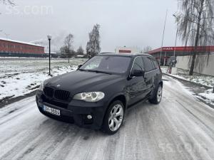 Black BMW X5 2011 in Aizkraukle, with an engine capacity of 3.00 L and mileage of 235 thousand km for 13800 €, photo 4 on AUTOMOTO.COM.LV