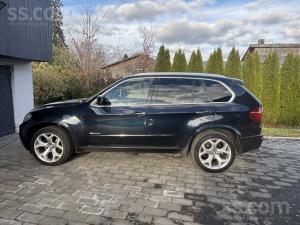 Black BMW X5 2011 in Aizkraukle, with an engine capacity of 3.00 L and mileage of 235 thousand km for 13800 €, photo 6 on AUTOMOTO.COM.LV