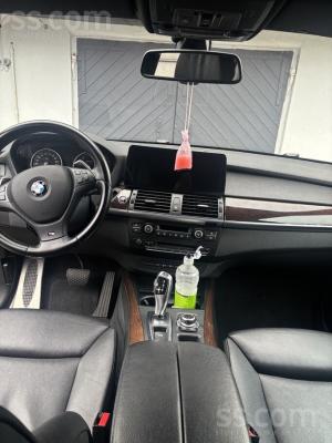Black BMW X5 2011 in Aizkraukle, with an engine capacity of 3.00 L and mileage of 235 thousand km for 13800 €, photo 10 on AUTOMOTO.COM.LV