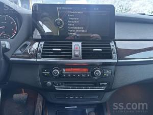 Black BMW X5 2011 in Aizkraukle, with an engine capacity of 3.00 L and mileage of 235 thousand km for 13800 €, photo 12 on AUTOMOTO.COM.LV