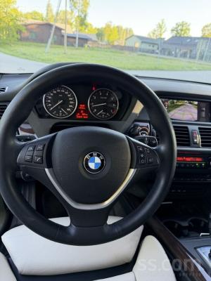 Melns BMW X5 2011 Jelgava, ar dzinēja tilpumu 4.40 L un nobraukumu 212 tūkst. km par 13000 €, foto 17 vietnē AUTOMOTO.COM.LV