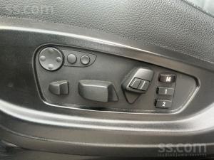 Black BMW X5 2011 in Riga, with an engine capacity of 3.00 L and mileage of 302 thousand km for 10900 €, photo 4 on AUTOMOTO.COM.LV