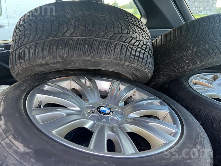 Black BMW X5 2011 in Riga, with an engine capacity of 3.00 L and mileage of 302 thousand km for 10900 €, photo 5 on AUTOMOTO.COM.LV