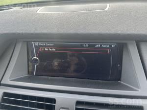 Black BMW X5 2011 in Riga, with an engine capacity of 3.00 L and mileage of 302 thousand km for 10900 €, photo 7 on AUTOMOTO.COM.LV