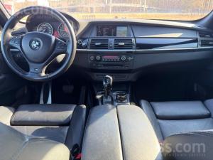 Black BMW X5 2011 in Riga, with an engine capacity of 3.00 L and mileage of 268 thousand km for 12950 €, photo 8 on AUTOMOTO.COM.LV