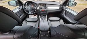 Black BMW X5 2011 in Riga, with an engine capacity of 3.00 L and mileage of 313 thousand km for 11900 €, photo 14 on AUTOMOTO.COM.LV