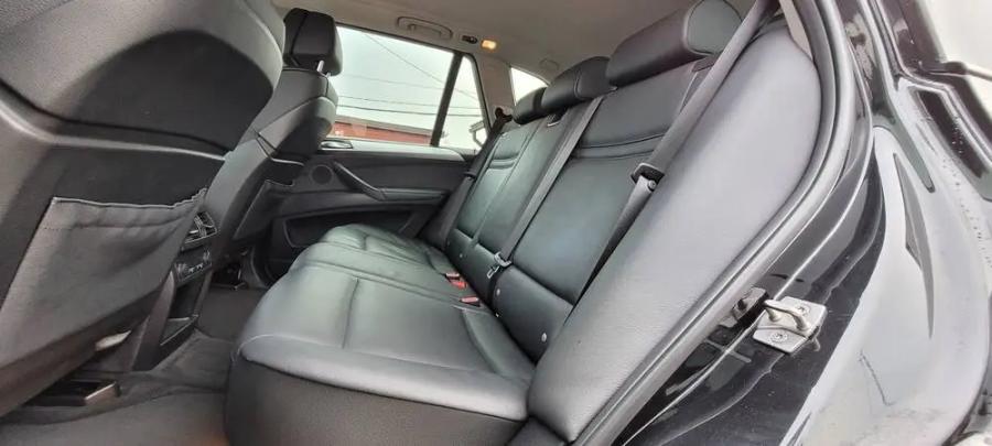 Black BMW X5 2011 in Riga, with an engine capacity of 3.00 L and mileage of 313 thousand km for 11900 €, photo 21 on AUTOMOTO.COM.LV
