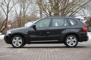 Black BMW X5 2011 in Riga, with an engine capacity of 3.00 L and mileage of 265 thousand km for 11690 €, photo 4 on AUTOMOTO.COM.LV
