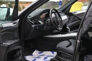 Black BMW X5 2011 in Riga, with an engine capacity of 3.00 L and mileage of 265 thousand km for 11690 €, photo 8 on AUTOMOTO.COM.LV