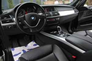Black BMW X5 2011 in Riga, with an engine capacity of 3.00 L and mileage of 265 thousand km for 11690 €, photo 12 on AUTOMOTO.COM.LV