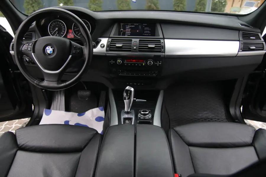 Black BMW X5 2011 in Riga, with an engine capacity of 3.00 L and mileage of 265 thousand km for 11690 €, photo 13 on AUTOMOTO.COM.LV