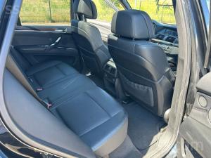 Black BMW X5 2011 in Riga, with an engine capacity of 3.00 L and mileage of 282 thousand km for 12000 €, photo 19 on AUTOMOTO.COM.LV