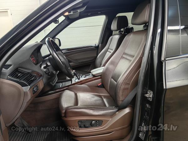 Black BMW X5 2011 in Viljandi, with an engine capacity of 3.00 L and mileage of 234 thousand km for 15490 €, photo 4 on AUTOMOTO.COM.LV