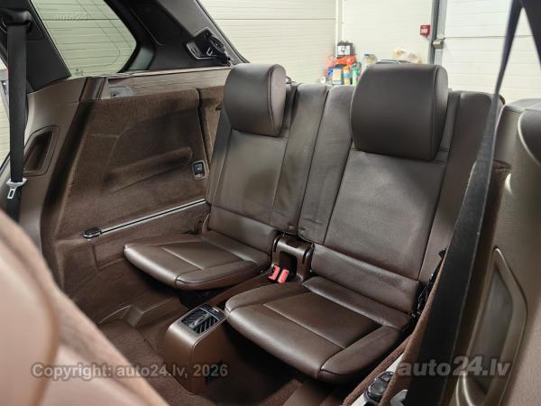 Black BMW X5 2011 in Viljandi, with an engine capacity of 3.00 L and mileage of 234 thousand km for 15490 €, photo 8 on AUTOMOTO.COM.LV