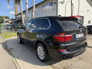 Black BMW X5 2011 in Riga, with an engine capacity of 3.00 L and mileage of 234 thousand km for 11000 €, photo 8 on AUTOMOTO.COM.LV