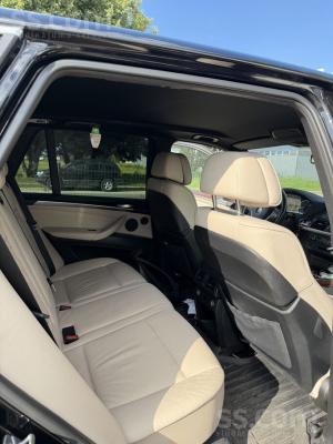 Black BMW X5 2011 in Riga, with an engine capacity of 3.00 L and mileage of 234 thousand km for 11000 €, photo 17 on AUTOMOTO.COM.LV