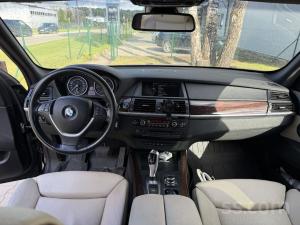 Black BMW X5 2011 in Riga, with an engine capacity of 3.00 L and mileage of 234 thousand km for 11000 €, photo 12 on AUTOMOTO.COM.LV