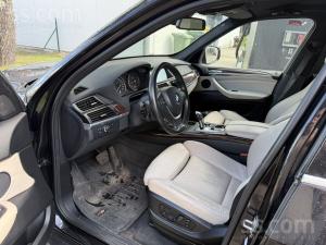 Black BMW X5 2011 in Riga, with an engine capacity of 3.00 L and mileage of 234 thousand km for 11000 €, photo 14 on AUTOMOTO.COM.LV