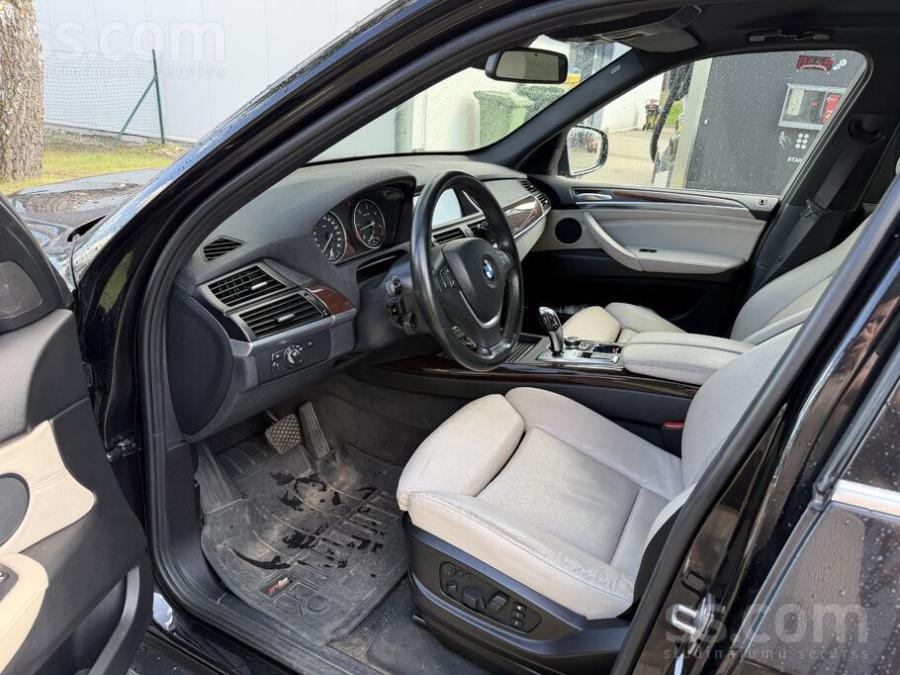Black BMW X5 2011 in Riga, with an engine capacity of 3.00 L and mileage of 234 thousand km for 11000 €, photo 14 on AUTOMOTO.COM.LV