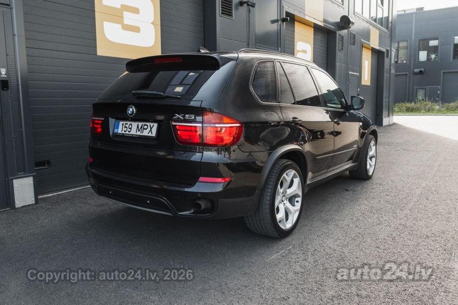 Black BMW X5 2011 in Tallinn, with an engine capacity of 3.00 L and mileage of 393 thousand km for 7990 €, photo 4 on AUTOMOTO.COM.LV