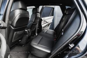 Black BMW X5 2011 in Tallinn, with an engine capacity of 3.00 L and mileage of 393 thousand km for 7990 €, photo 8 on AUTOMOTO.COM.LV