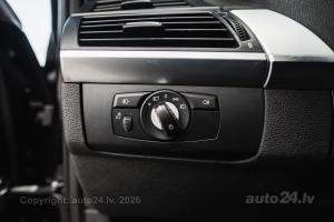 Black BMW X5 2011 in Tallinn, with an engine capacity of 3.00 L and mileage of 393 thousand km for 7990 €, photo 12 on AUTOMOTO.COM.LV