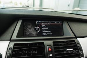 Black BMW X5 2011 in Tallinn, with an engine capacity of 3.00 L and mileage of 393 thousand km for 7990 €, photo 19 on AUTOMOTO.COM.LV