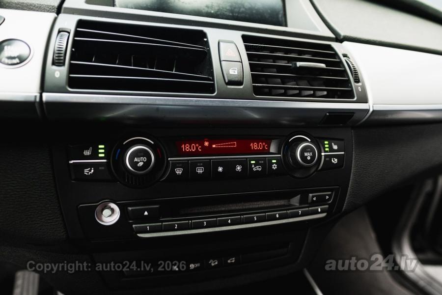 Black BMW X5 2011 in Tallinn, with an engine capacity of 3.00 L and mileage of 393 thousand km for 7990 €, photo 20 on AUTOMOTO.COM.LV