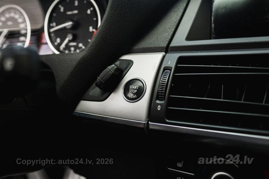 Black BMW X5 2011 in Tallinn, with an engine capacity of 3.00 L and mileage of 393 thousand km for 7990 €, photo 23 on AUTOMOTO.COM.LV