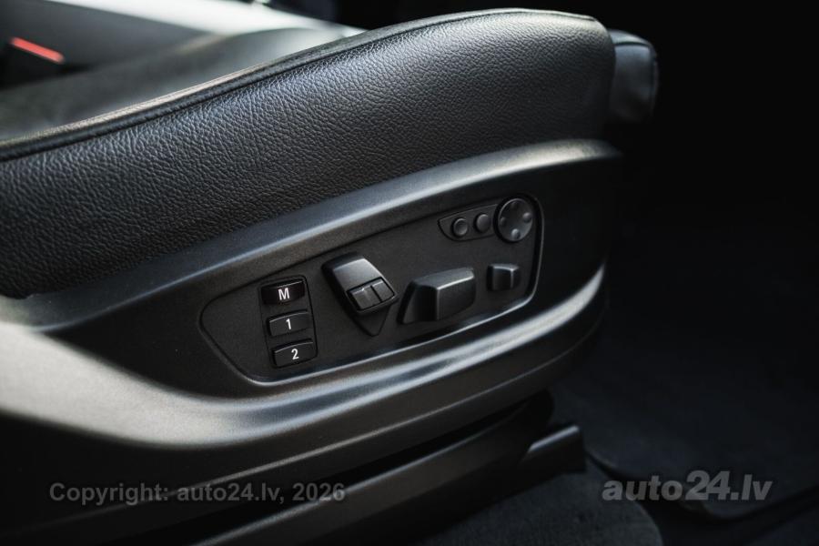 Black BMW X5 2011 in Tallinn, with an engine capacity of 3.00 L and mileage of 393 thousand km for 7990 €, photo 25 on AUTOMOTO.COM.LV