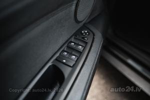 Black BMW X5 2011 in Tallinn, with an engine capacity of 3.00 L and mileage of 393 thousand km for 7990 €, photo 26 on AUTOMOTO.COM.LV
