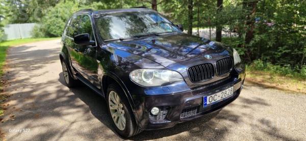 Black BMW X5 2011 in Riga, with an engine capacity of 3.00 L and mileage of 265 thousand km for 14500 €, photo 9 on AUTOMOTO.COM.LV