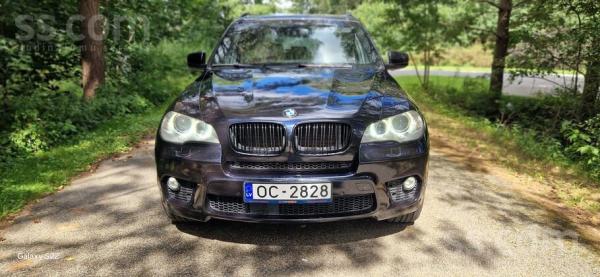 Black BMW X5 2011 in Riga, with an engine capacity of 3.00 L and mileage of 265 thousand km for 14500 €, photo 10 on AUTOMOTO.COM.LV