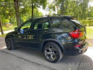 Black BMW X5 2011 in Riga, with an engine capacity of 3.00 L and mileage of 344 thousand km for 9450 €, photo  on AUTOMOTO.COM.LV