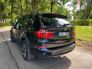 Black BMW X5 2011 in Riga, with an engine capacity of 3.00 L and mileage of 344 thousand km for 9450 €, photo 4 on AUTOMOTO.COM.LV
