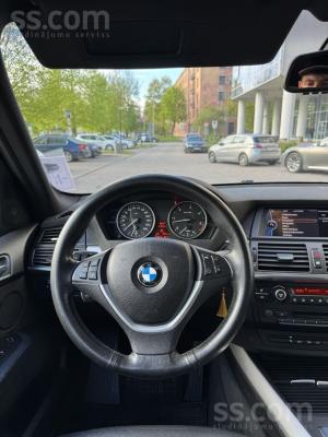 Black BMW X5 2011 in Riga, with an engine capacity of 3.00 L and mileage of 244 thousand km for 12999 €, photo 6 on AUTOMOTO.COM.LV