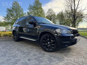Black BMW X5 2011 in Riga, with an engine capacity of 3.00 L and mileage of 244 thousand km for 12999 €, photo 11 on AUTOMOTO.COM.LV